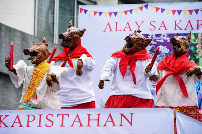 Mother Mary honored with 'lechon' parade - UCA News