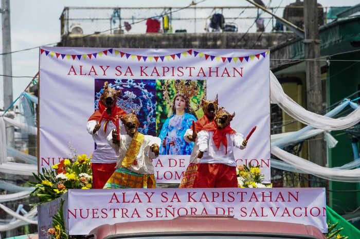 Mother Mary honored with 'lechon' parade - UCA News