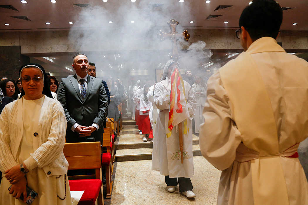 Iraqi Catholics celebrate Easter amid cloud of Mideast war - UCA News