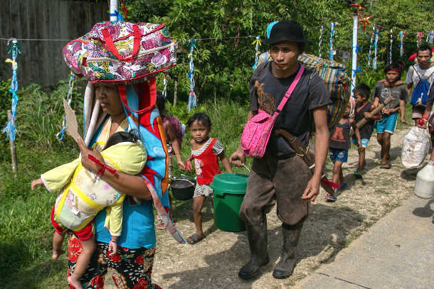 Displaced tribal people of Mindanao trek back home - UCA News