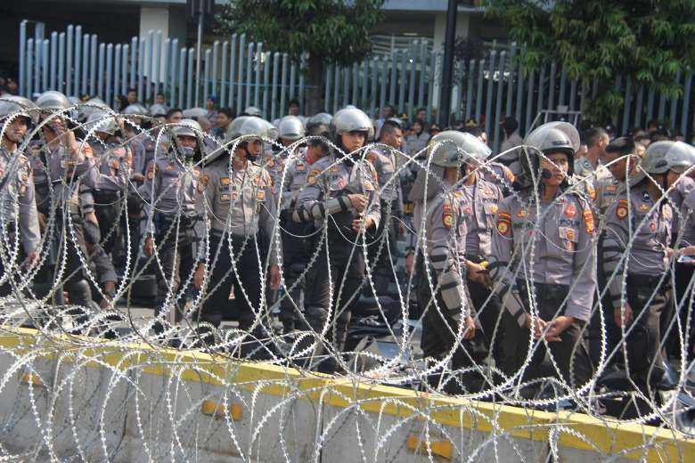 Top Indonesian cop wants softer approach to protests - UCA News