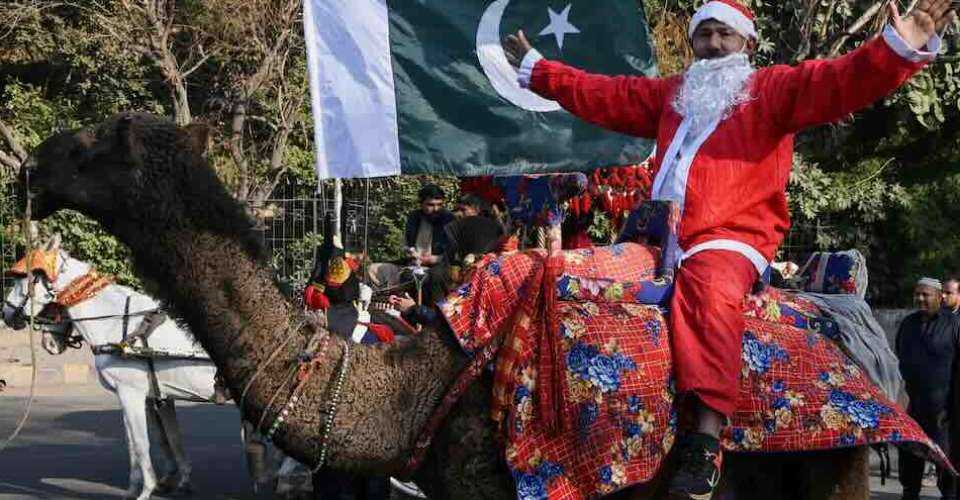 Christmas rallies bring rare public visibility to Pakistan's Christians ...